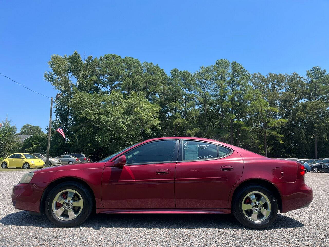 Maroon Pontiac